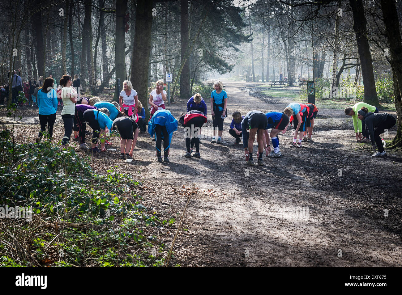 Walkers stretching after a long walk Stock Photo - Alamy