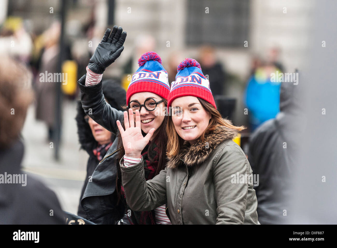 Tourists wearing colourful I Love London hats Stock Photo - Alamy