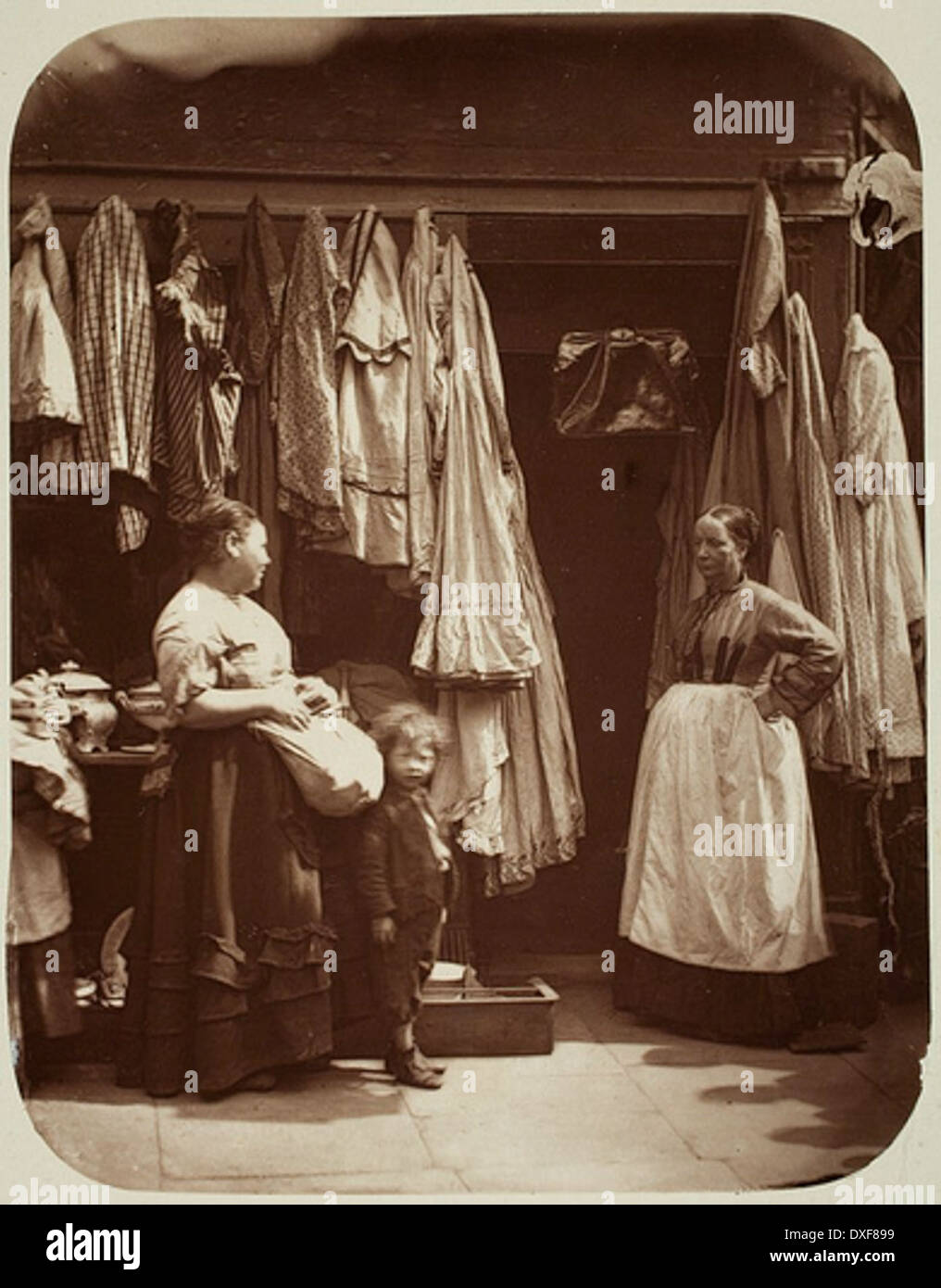 This vintage photo shows an old clothes shop in Seven Dials, London ...