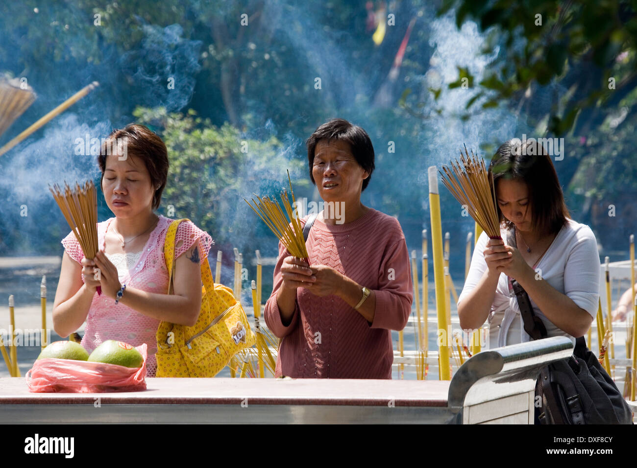 Worship at a Taoist temple on the island of Lantau in Hong Kong. Taoism ...