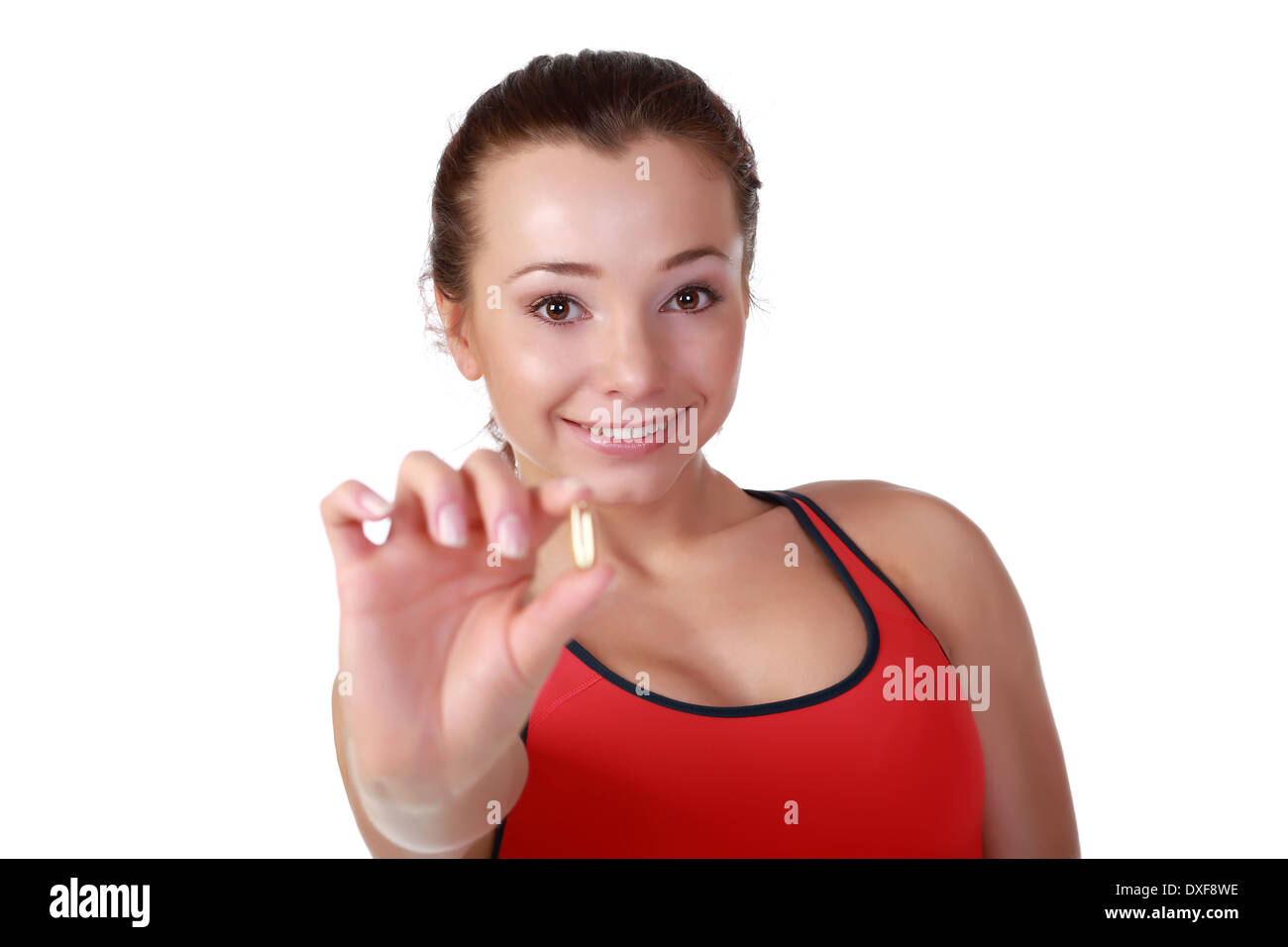 Female fitness model with Omega-3 acid pills Stock Photo - Alamy