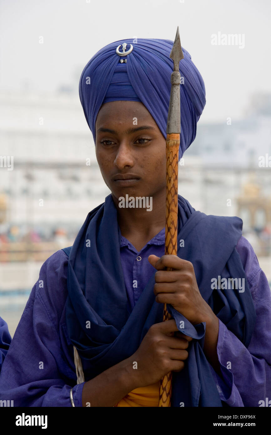 Sikh temple guard at the Golden Temple Complex in the Sikh city of ...