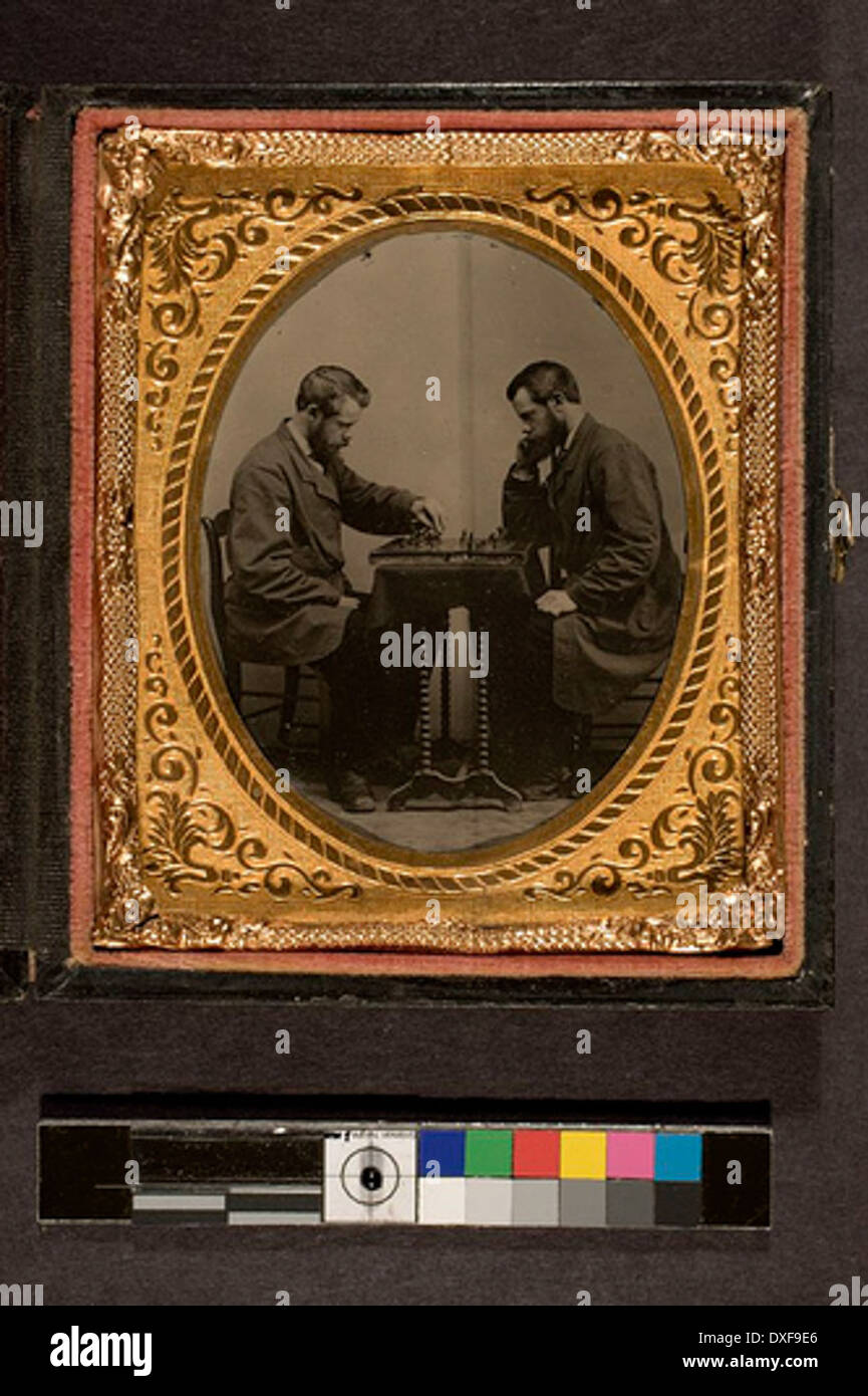 This double portrait captures a man playing chess, offering a quiet yet ...