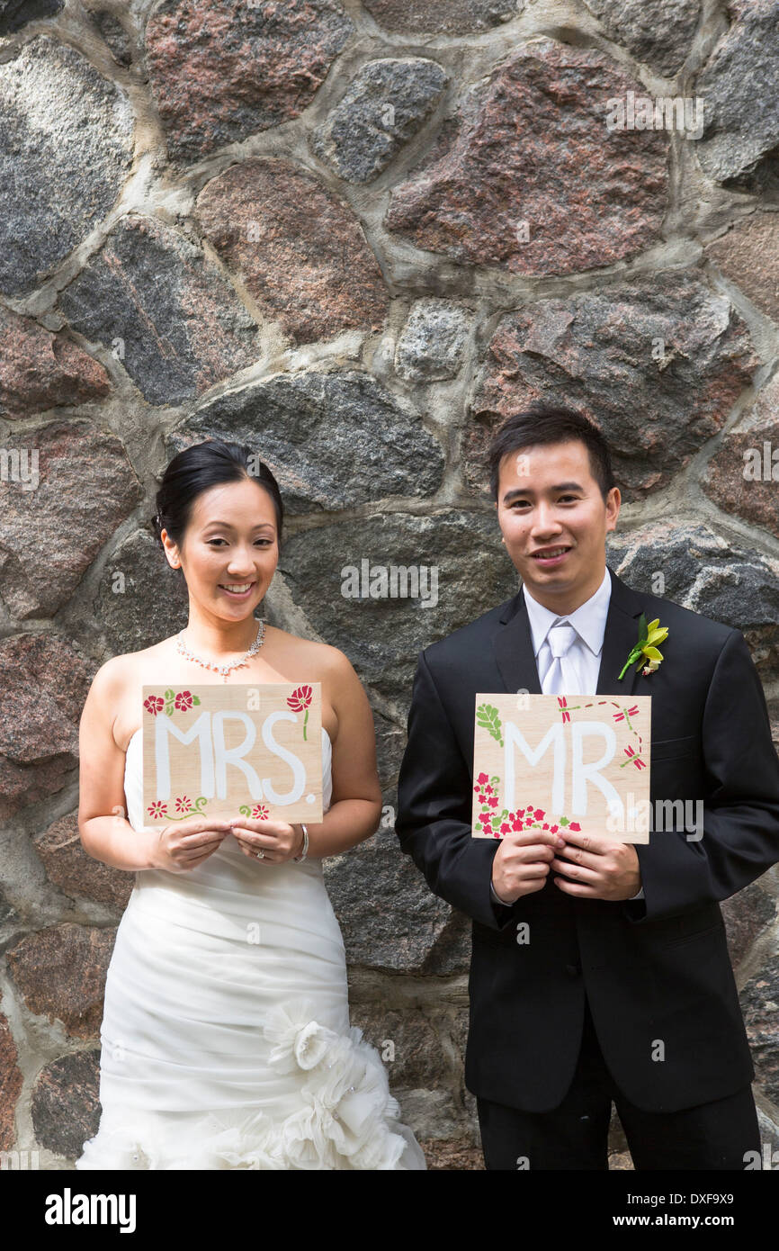 Portrait of Married Couple with Mr and Mrs Signs Stock Photo - Alamy