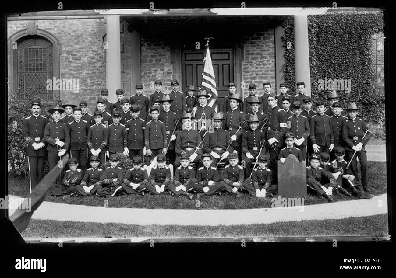 This historical group portrait showcases individuals from a bygone era ...