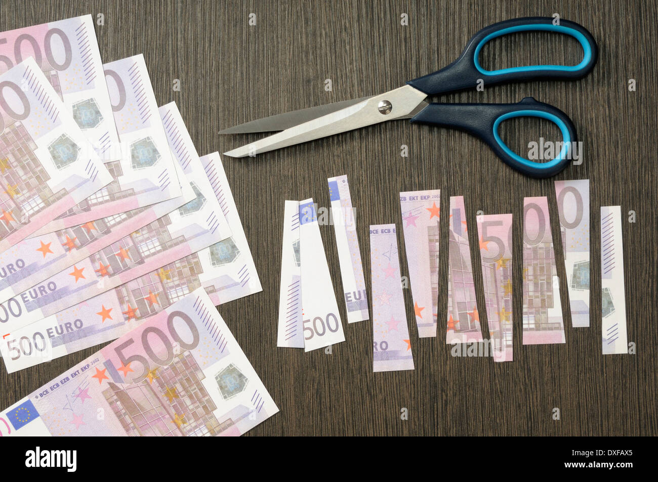 Euro Notes with Scissors, One Cut up, Studio Shot Stock Photo - Alamy