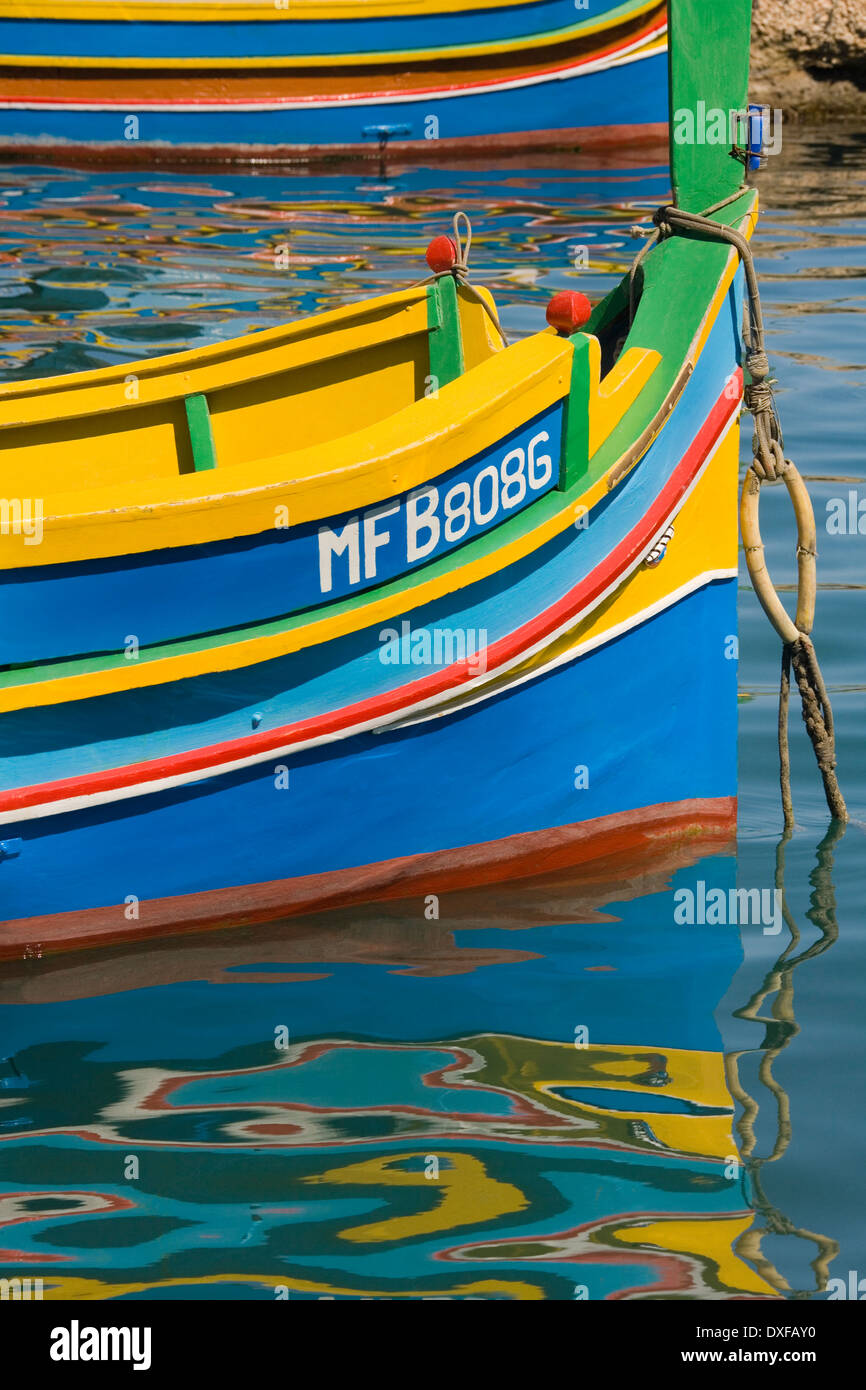 Traditional Luzzu fishing boat in Marsaxlokk harbor on the ...