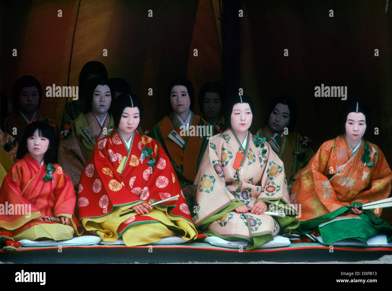 Traditional court ladies and child in colorful kimonos at Aoi Matsuri ...