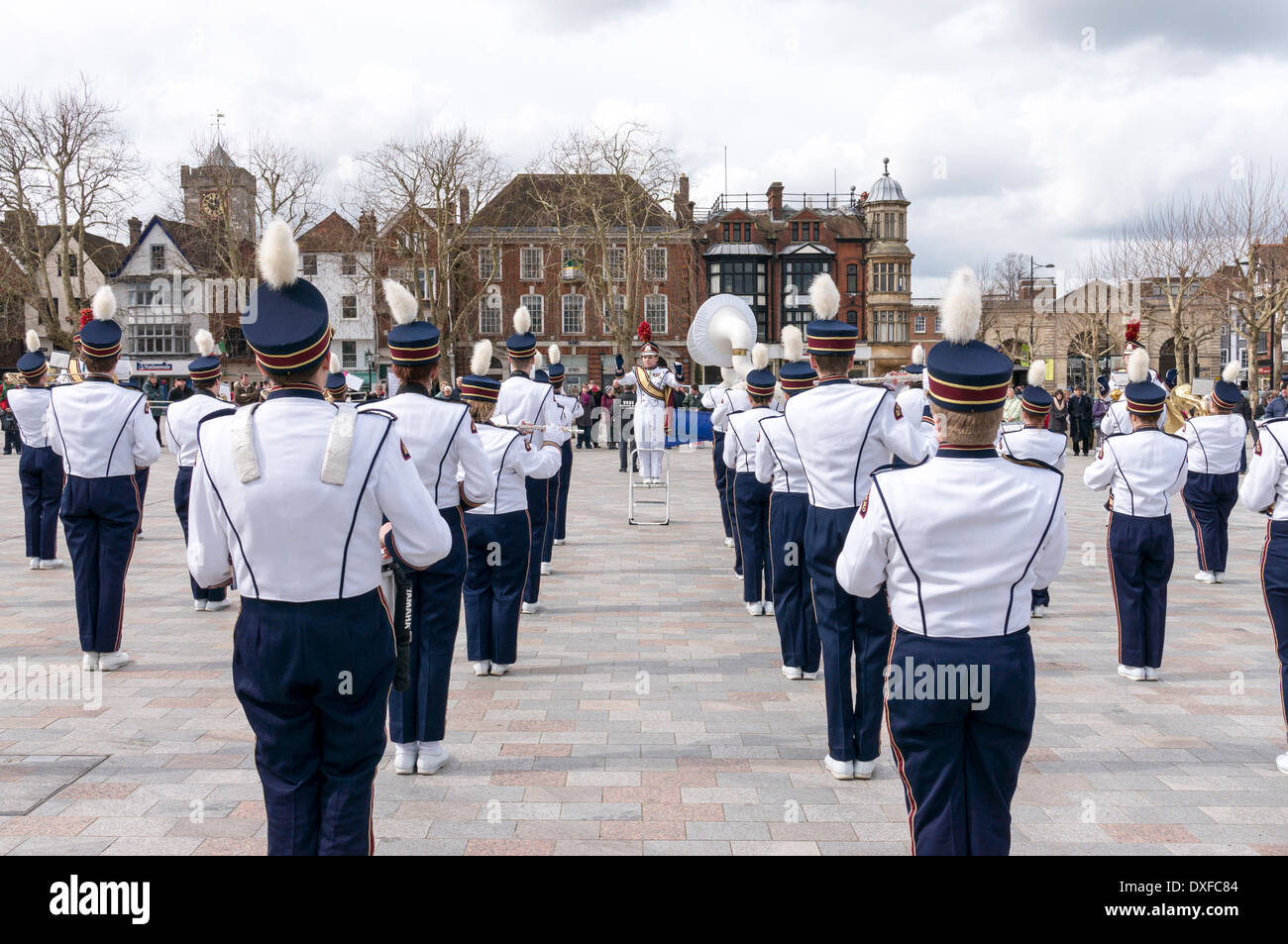 View between ranks of American High School marching band musicians ...