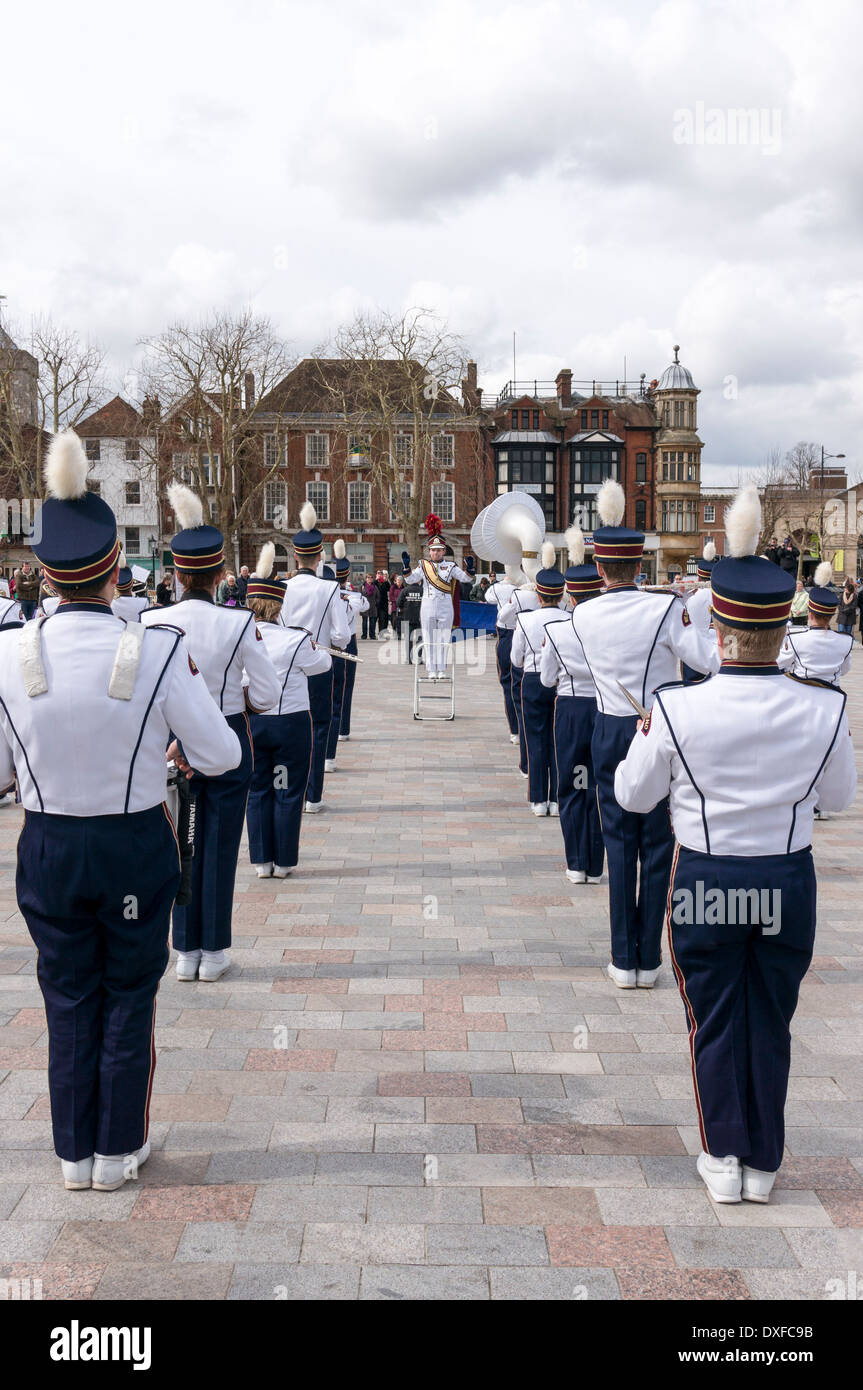 View between ranks of American High School marching band musicians ...