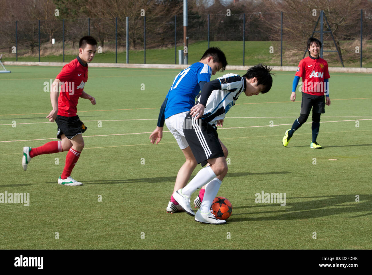 Students playing a practise game of football, Warwick University, UK ...