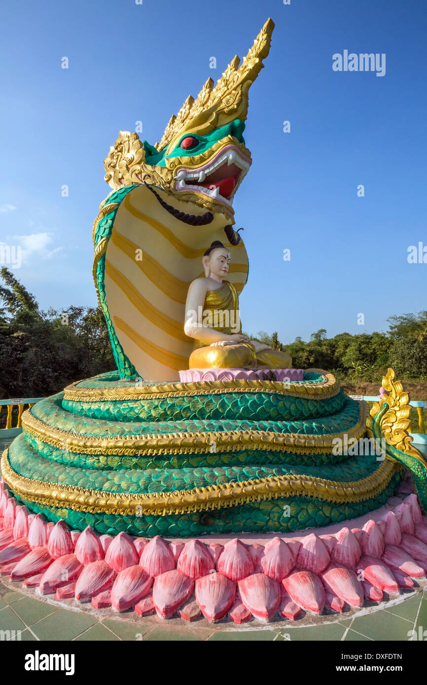 A Buddha Image protected by a Naga (mythical serpent-like creature ...