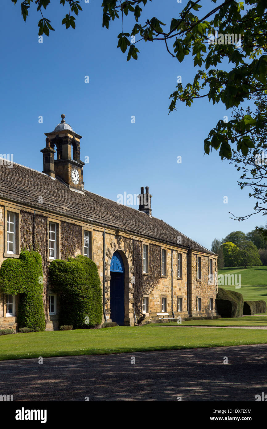 The gatehouse of a large manor house in spring. North Yorkshire in the ...