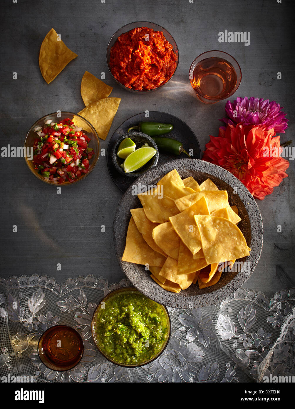Variety of salsas, condiments and tortilla chips, Mexican Fiesta ...
