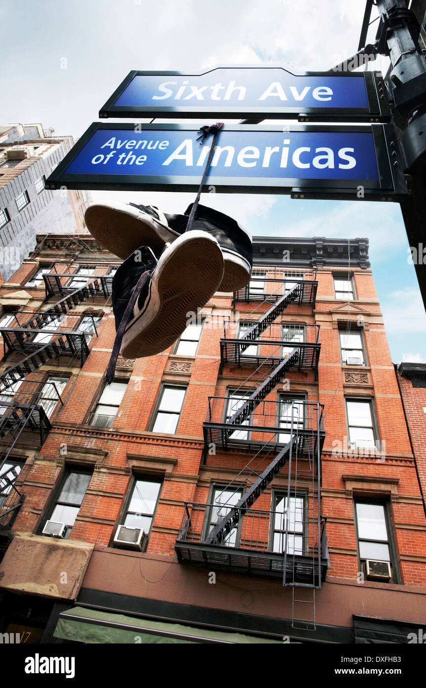 View of old brownstones and street signs, New York City, New York, USA ...