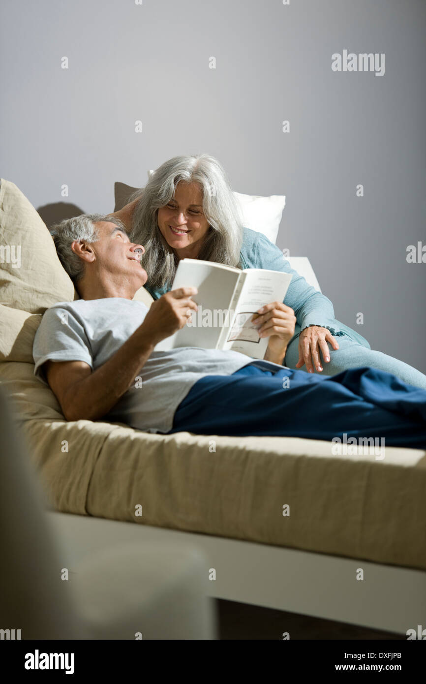 Mature couple in bed Stock Photo - Alamy