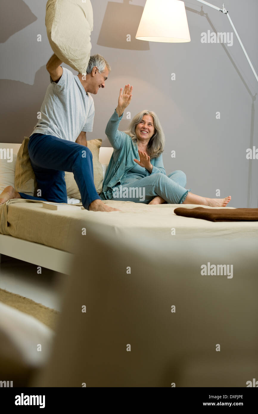 Mature couple in bed Stock Photo - Alamy