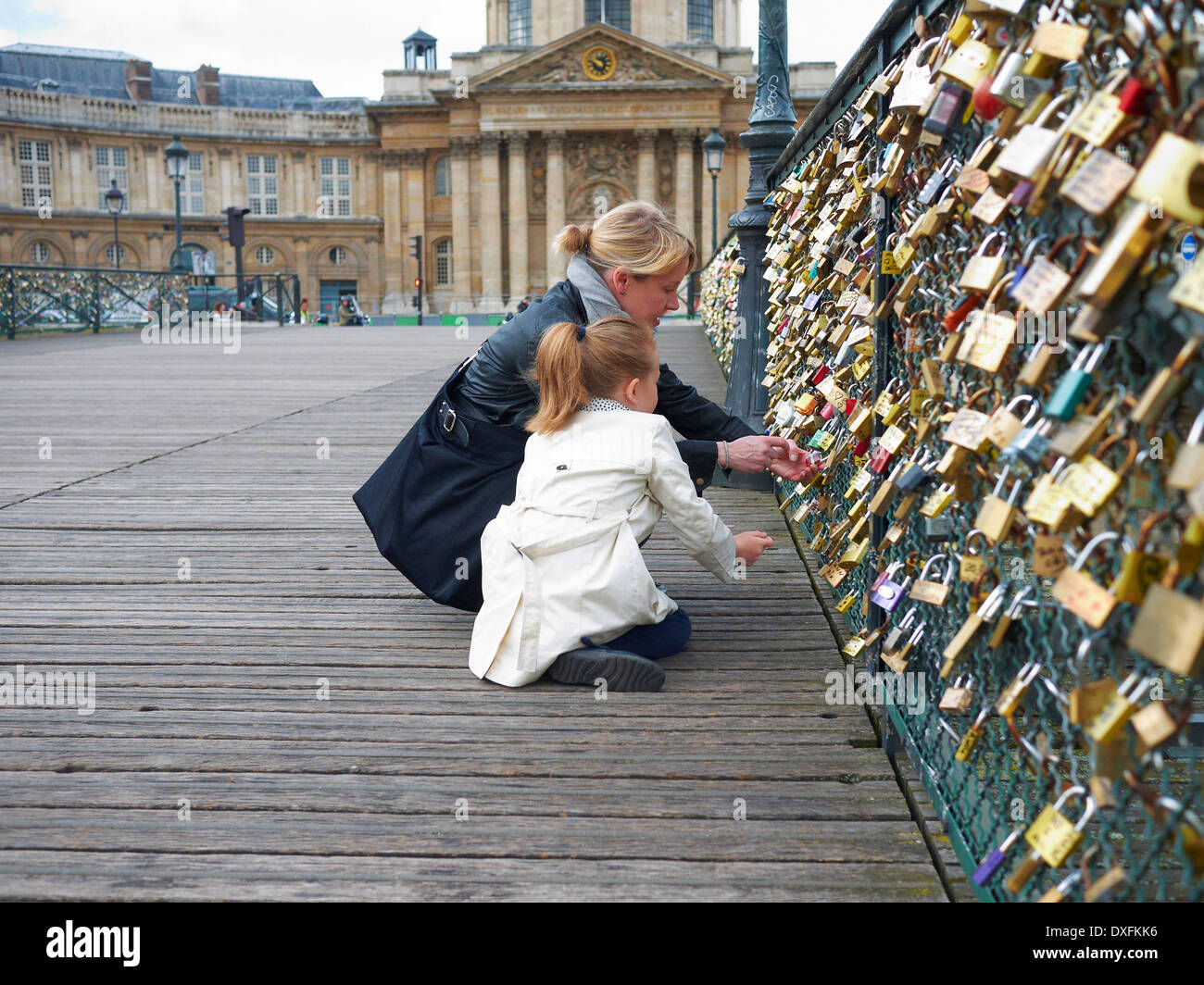 Mother and Daughter looking at Love Locks on Pont Des Arts, Paris ...