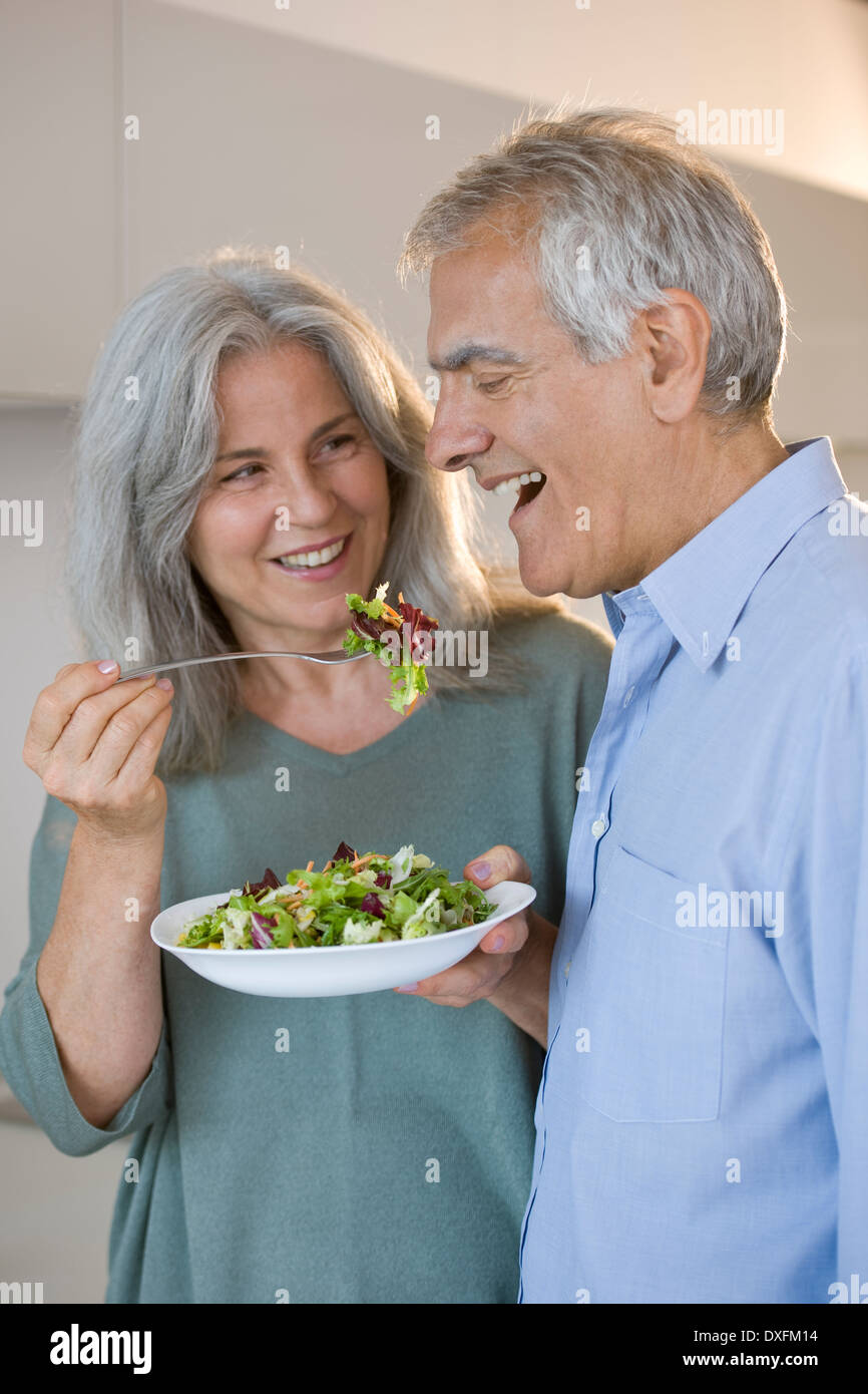 Mature adult man eating salad hi-res stock photography and images - Alamy