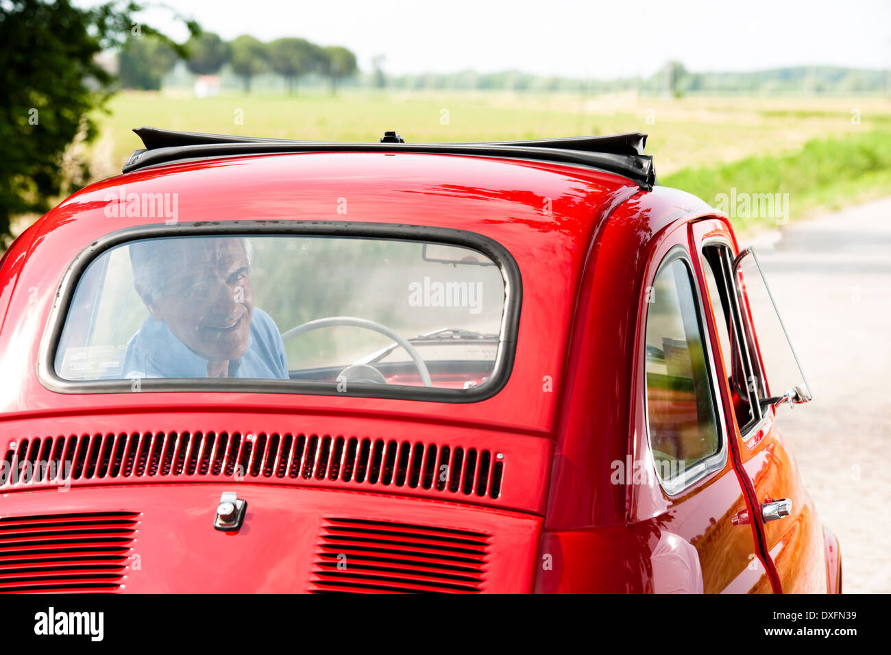 Man red car small hi-res stock photography and images - Alamy