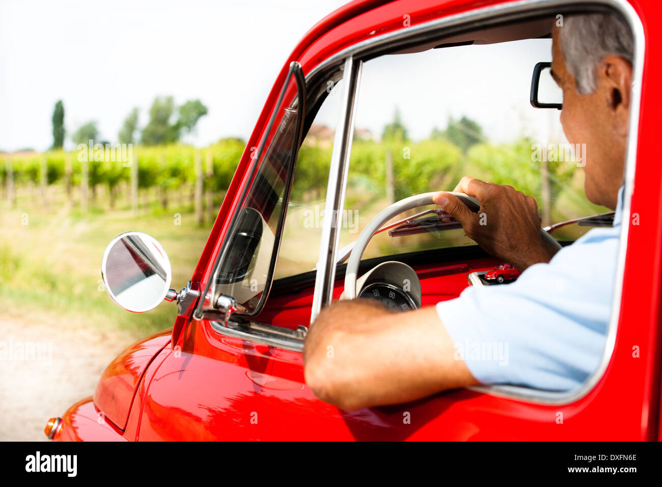 Man red car small hi-res stock photography and images - Alamy