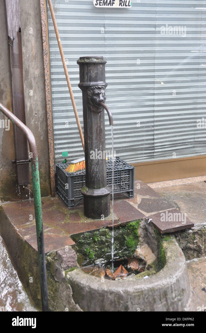 Drinking water fountain in a street in the Southern Italian village of ...
