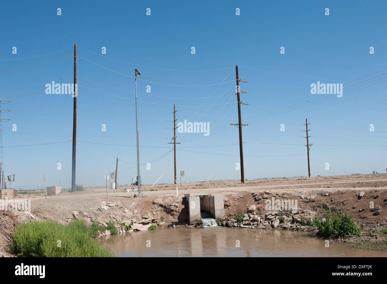 Calipatria, California, USA. 22nd Mar, 2014. An irrigation runoff ditch ...