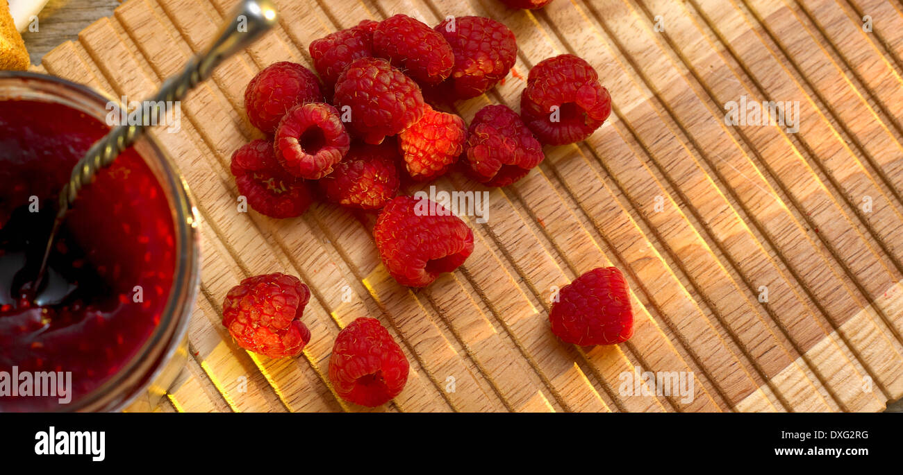 Raspberry Jam With Fresh Raspberries Stock Photo - Alamy