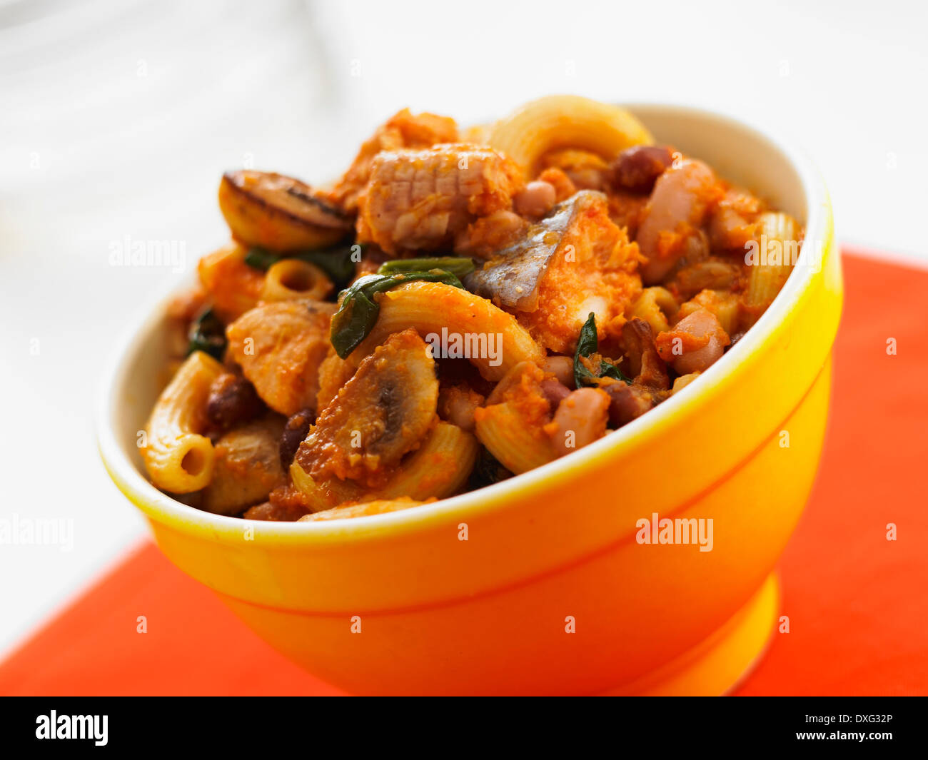 Macaroni With Fish Mushroom And Spinach Stock Photo - Alamy