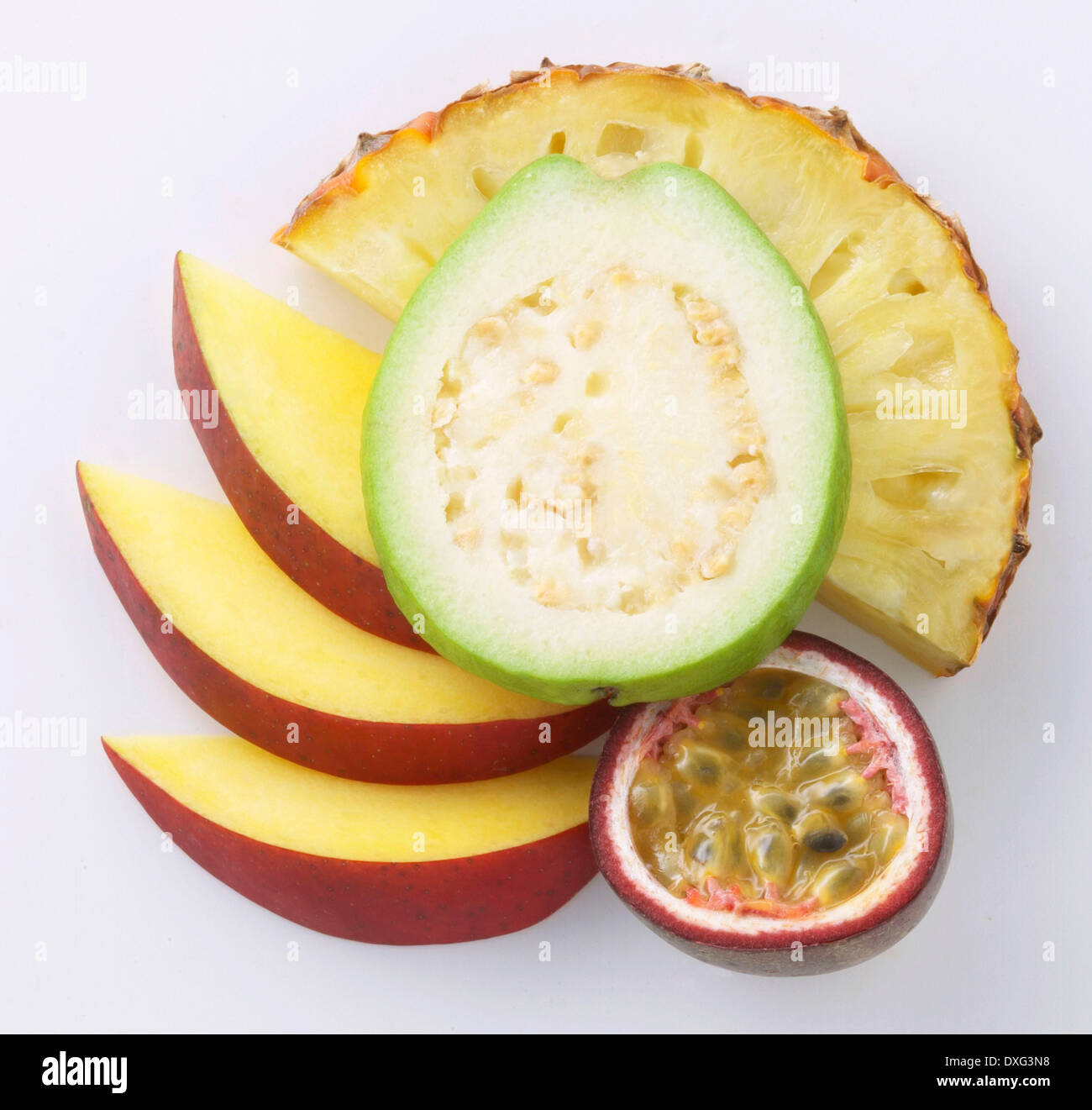 Sliced Tropical Fruit On White Background Stock Photo - Alamy