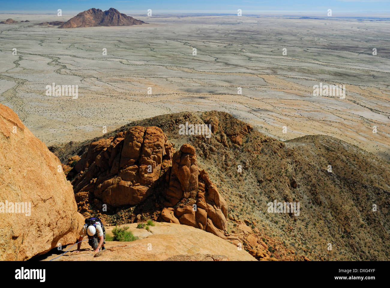Climbing the third pitch of the normal route, high up on Spitzkoppe ...