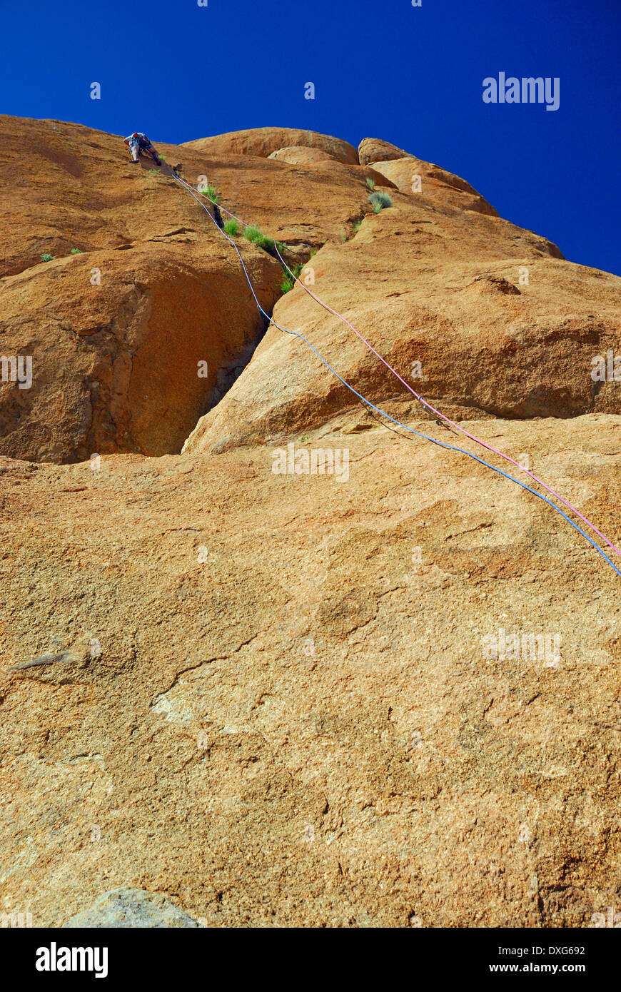 Climbing the second pitch of the normal route, high up on Spitzkoppe ...