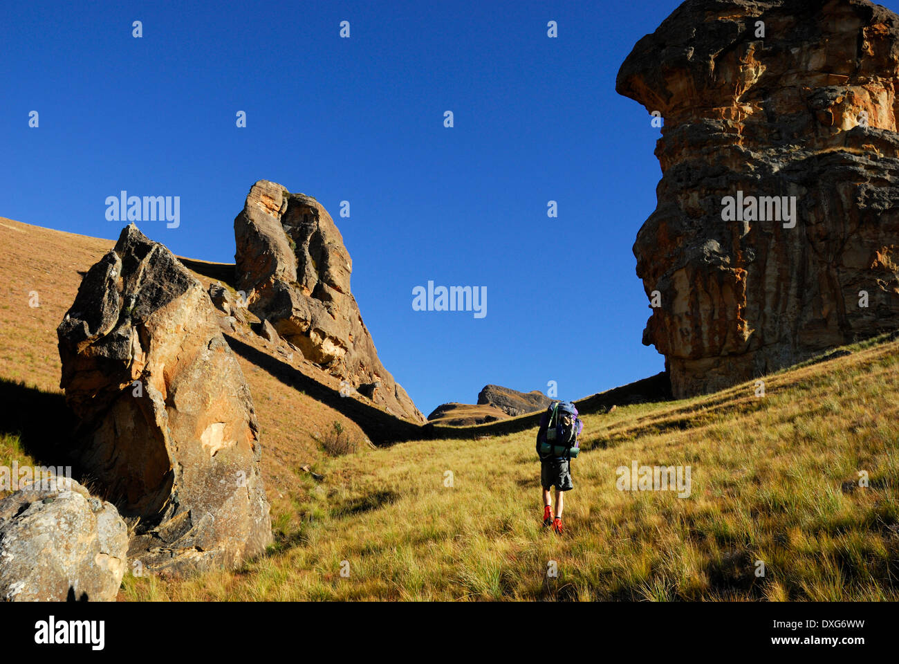 Hiking up from Lammergeier Cave towards Goat's Cave , Drakensberg ...