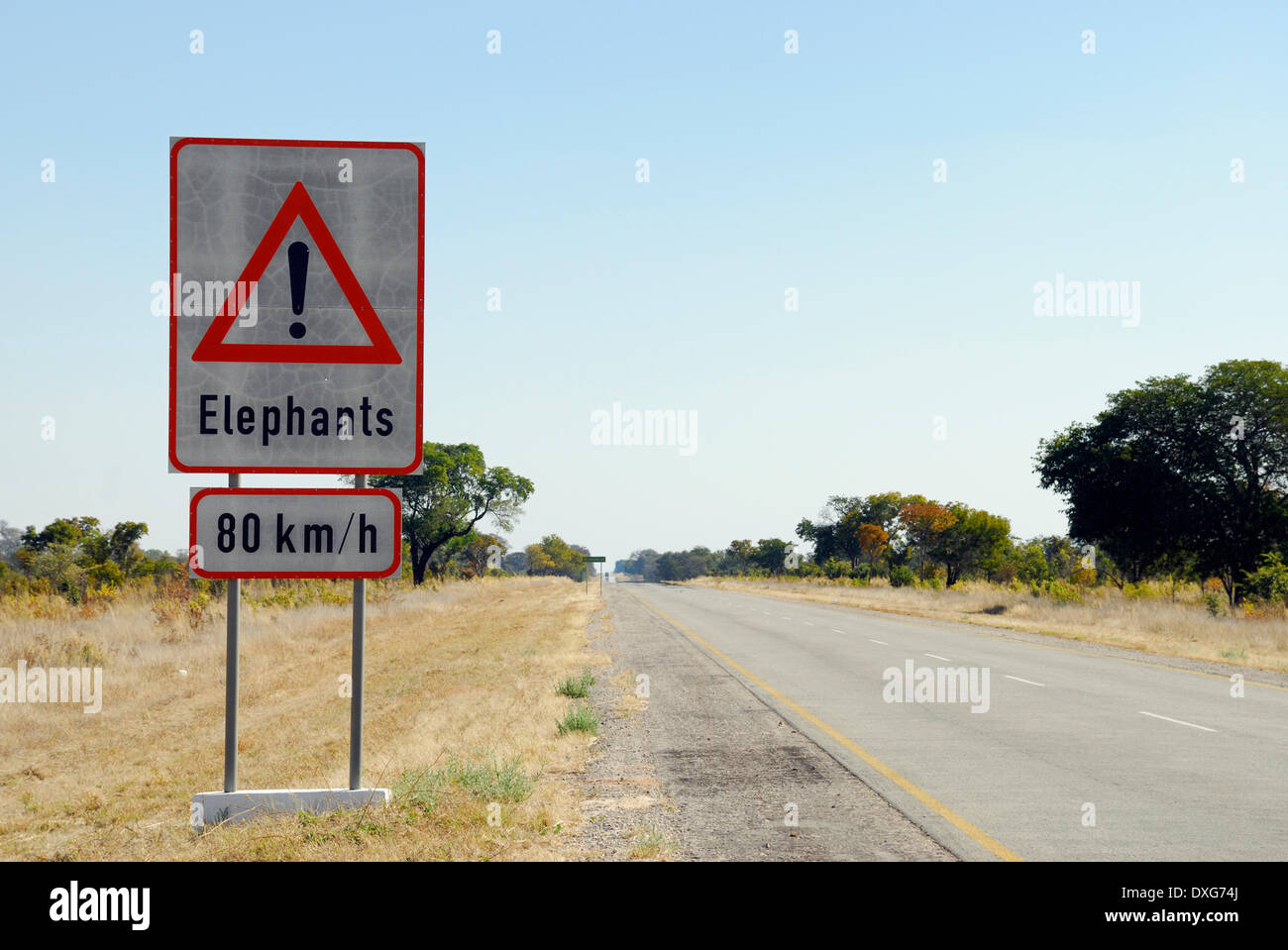 The main highway through Caprivi, Namibia, with elephant warning sign ...