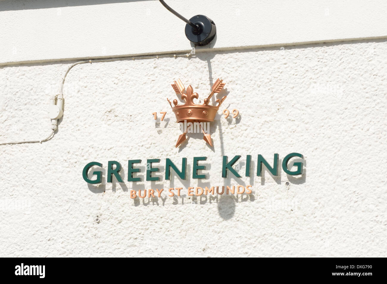 greene king wall sign Stock Photo - Alamy