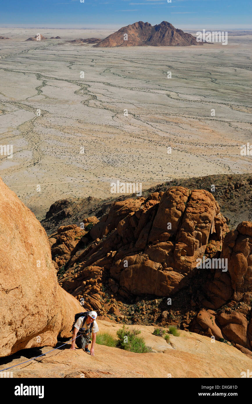 Climbing the third pitch of the normal route, high up on Spitzkoppe ...