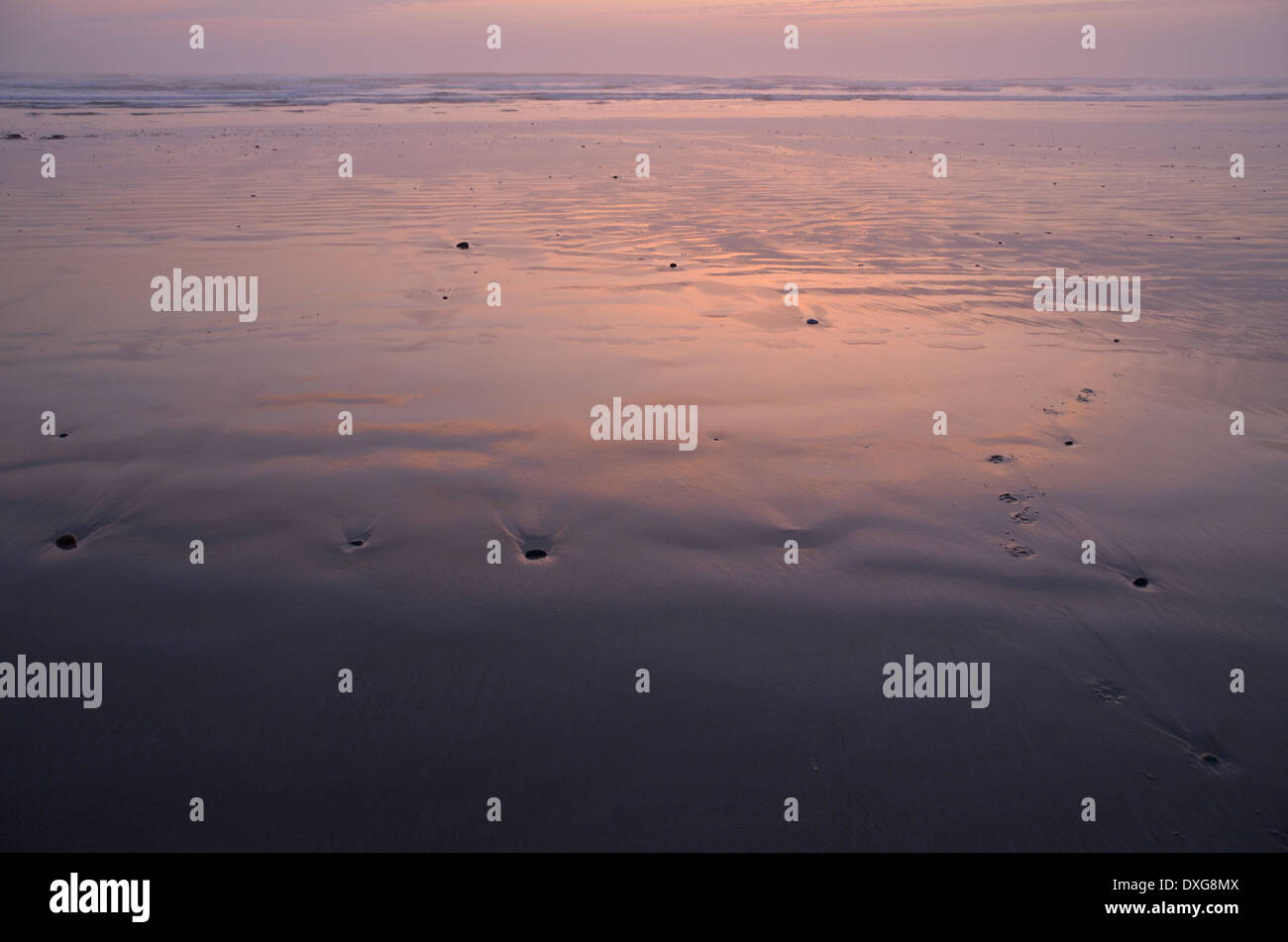 Beach at sunset on the beach of Sainte la Palud near the town of ...