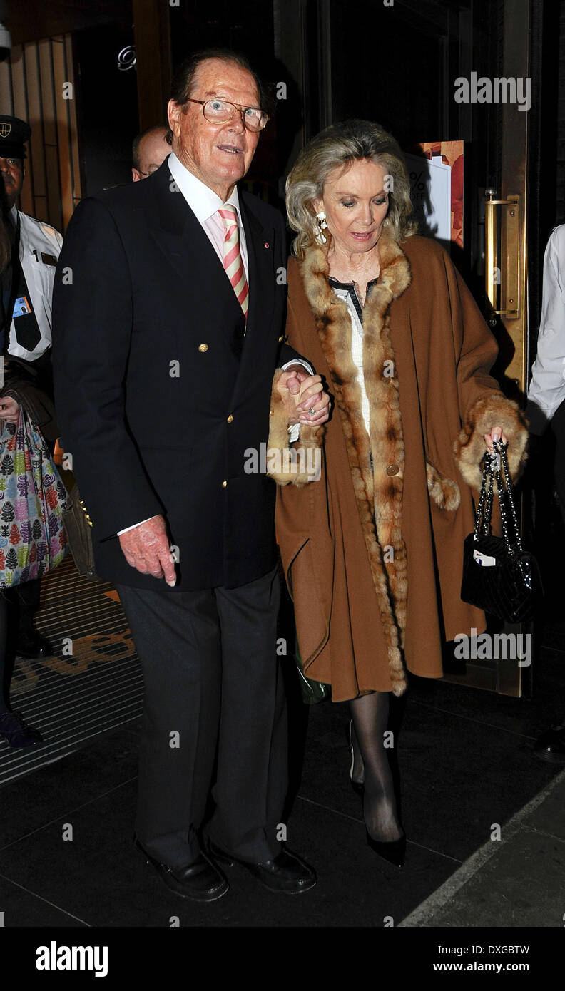 Sir Roger Moore and Kristina Tholstrup leaving Harrods in Knightsbridge ...