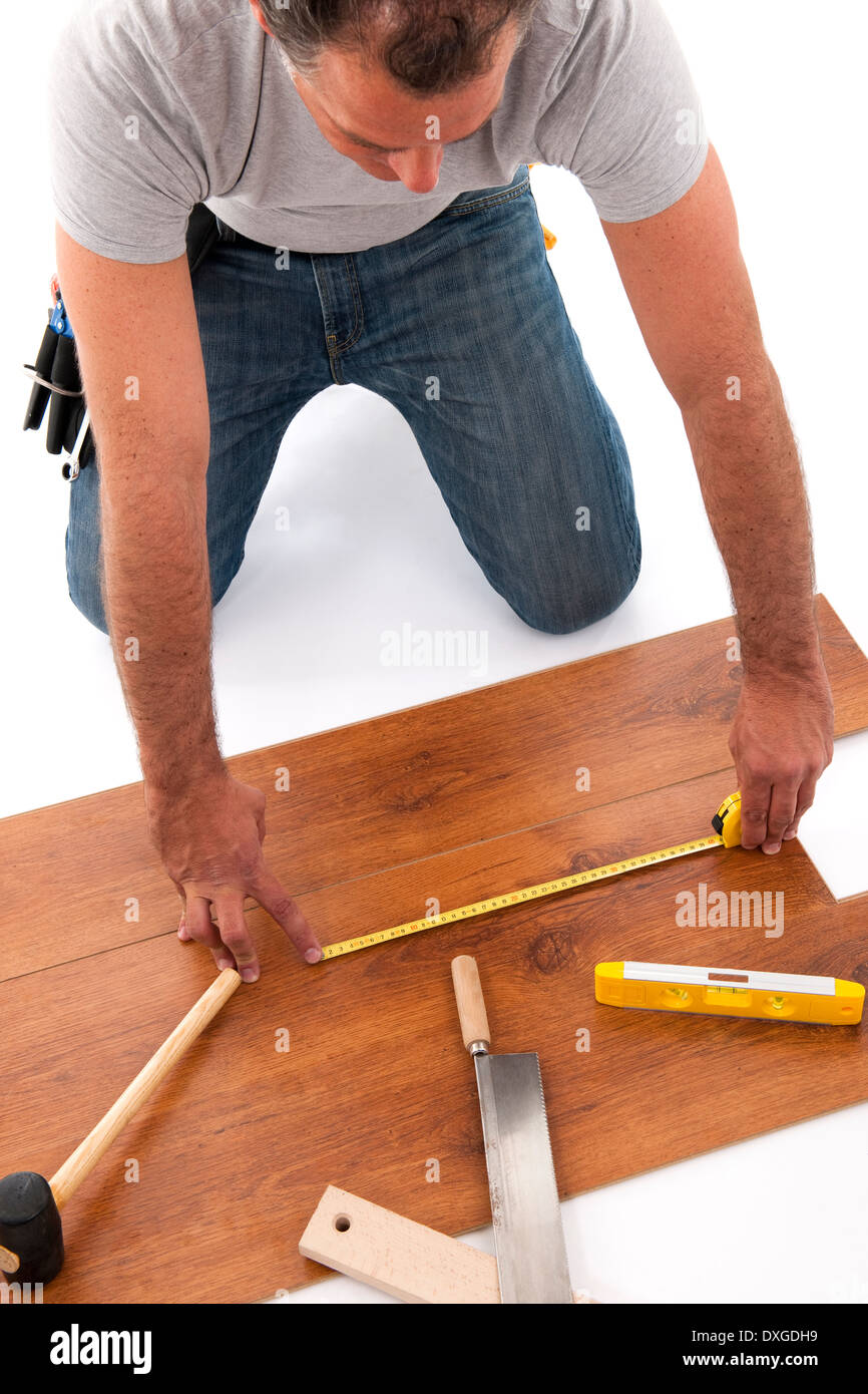 Carpenter working with wood planks Stock Photo - Alamy