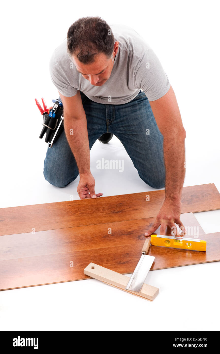 Carpenter working with wood planks Stock Photo - Alamy