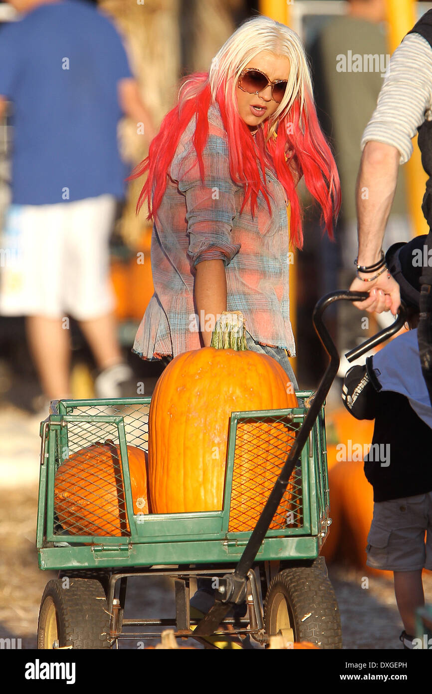 Christina Aguilera showing off her dyed red hair, as she enjoys a day at Mr. Bones Pumpkin Patch ...