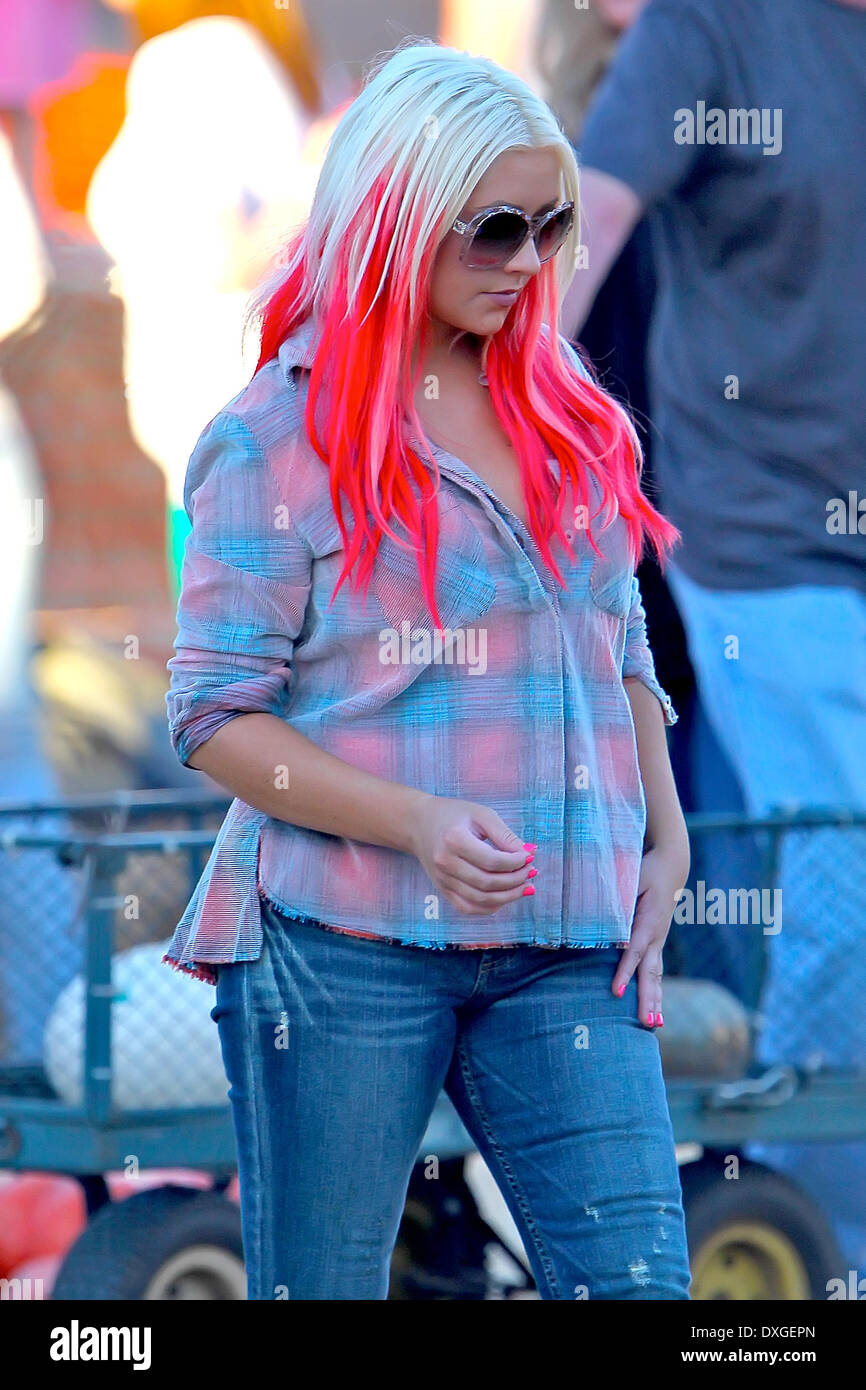 Christina Aguilera showing off her dyed red hair, as she enjoys a day at Mr. Bones Pumpkin Patch ...