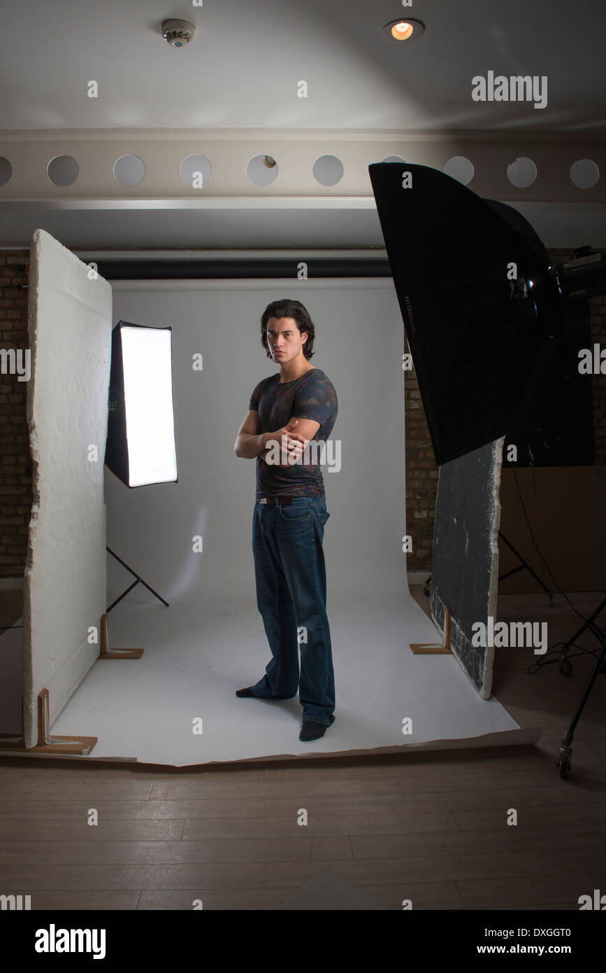 Photographic studio set up with handsome Malaysian man wearing posing ...