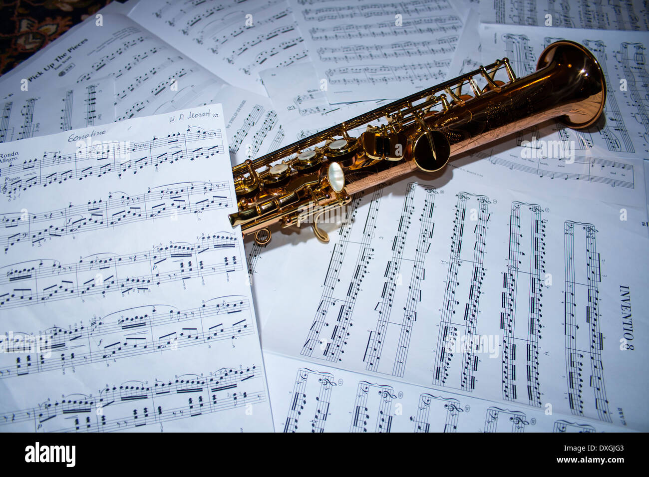 Saxophone covered with notes Stock Photo - Alamy