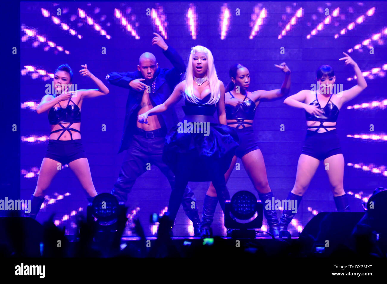 Nicki Minaj performs on stage at the Capital FM Arena during her' Pink ...