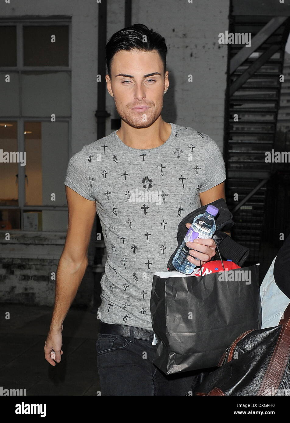 X Factor contestant Rylan Clark leaving a dance studio, holding a ...