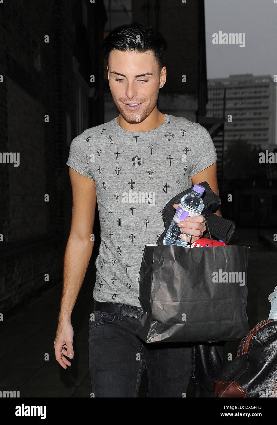 X Factor contestant Rylan Clark leaving a dance studio, holding a ...