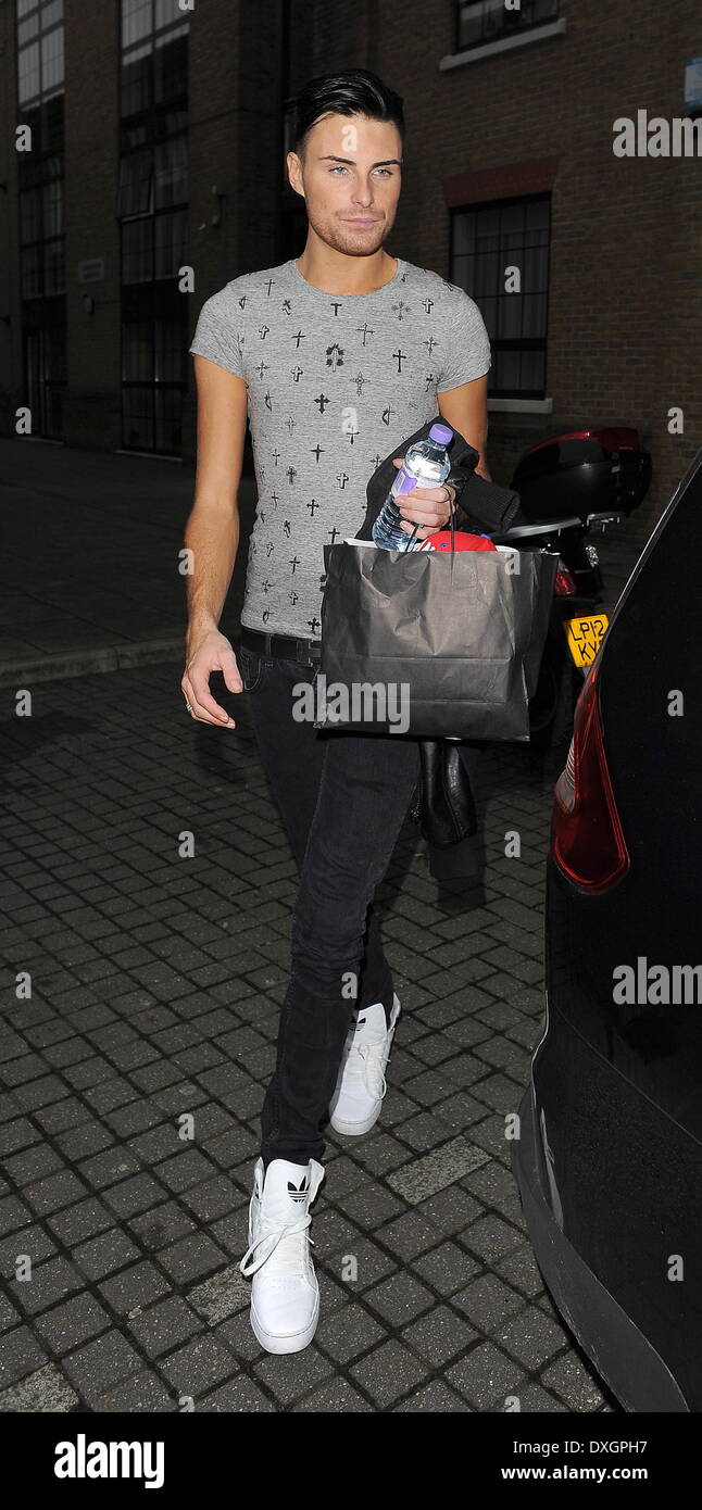 X Factor contestant Rylan Clark leaving a dance studio, holding a ...