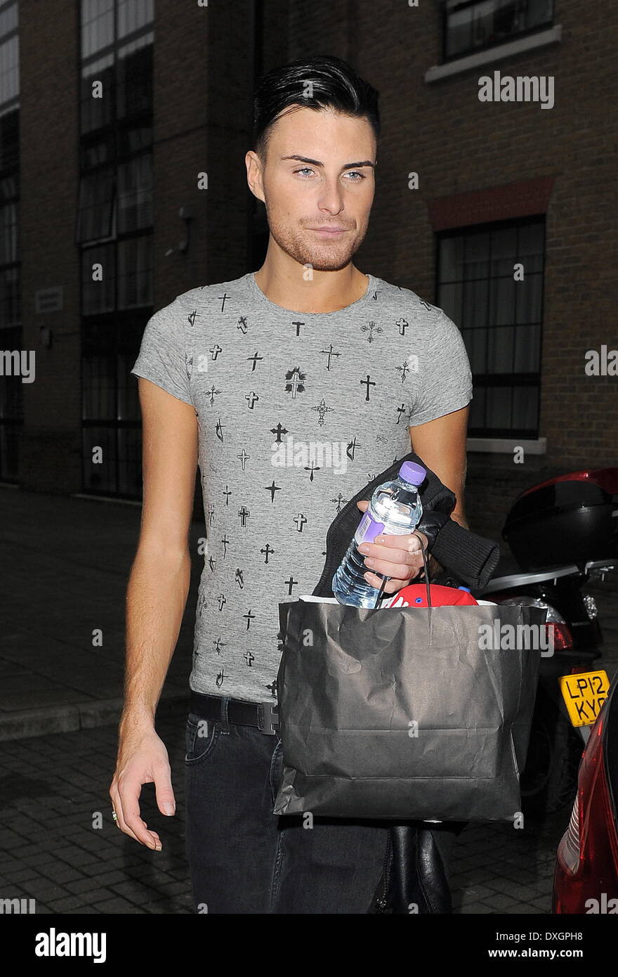 X Factor contestant Rylan Clark leaving a dance studio, holding a ...