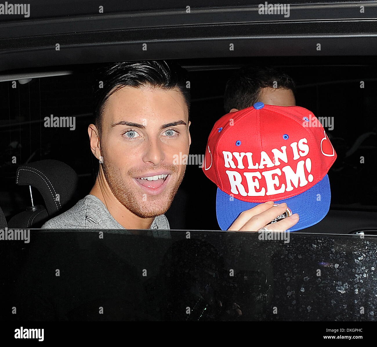 X Factor contestant Rylan Clark leaving a dance studio, holding a ...